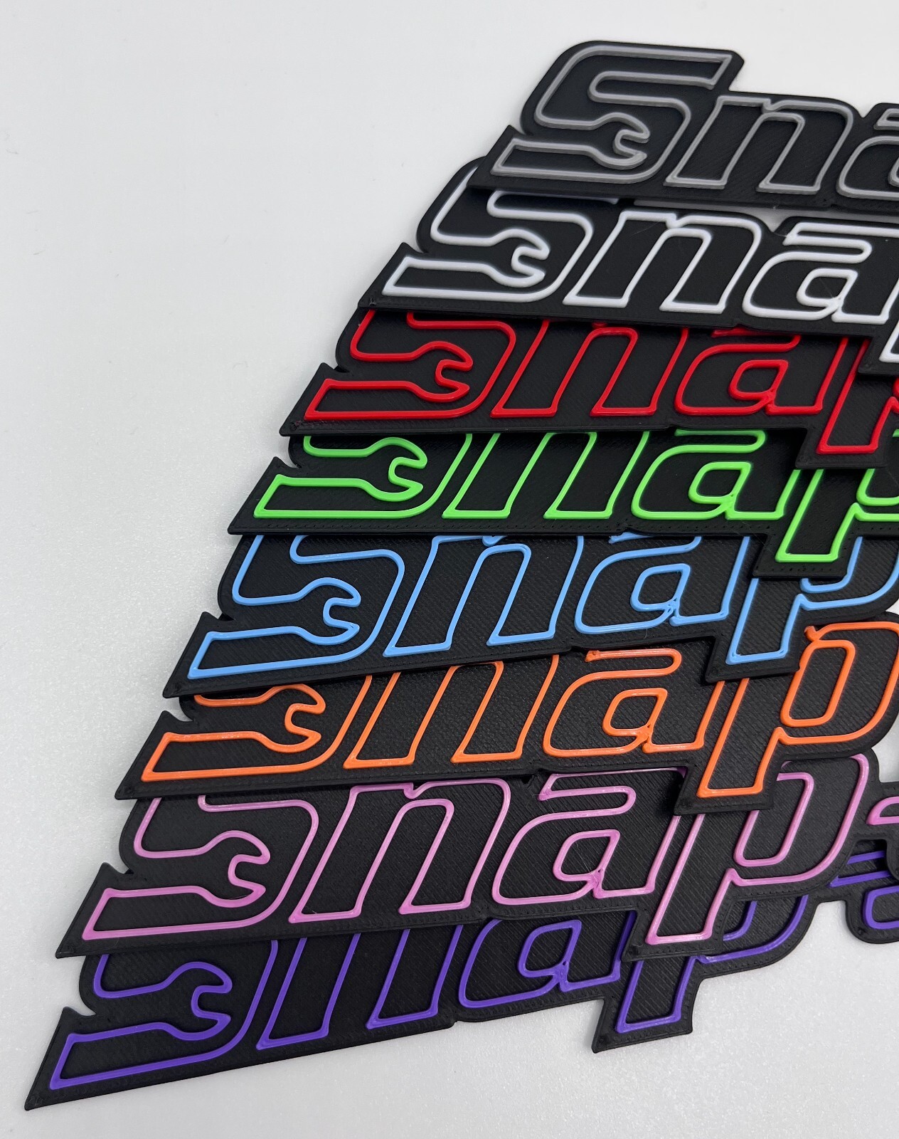 Two (2) Snap off Snap-off Snapoff parody emblems, raised lettering | eBay