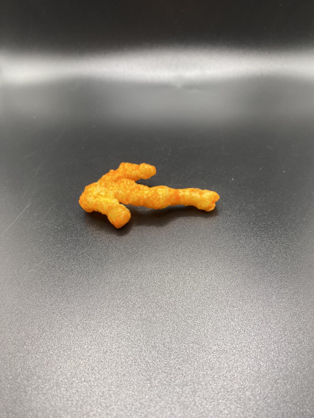 Crunchy Cheeto shaped like a ship’s Anchor or Arrow. | eBay
