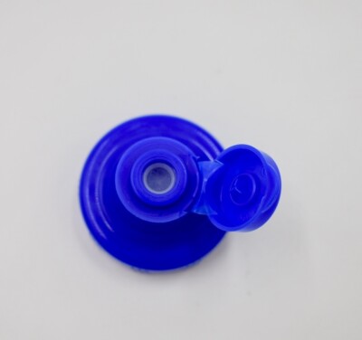 Aptar-38-400 Blue Flip Top Tab Caps with valve. Quantity 1200 units per ...