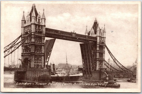 Tower Bridge With Bascules Raised Suspension Bridge London England ...