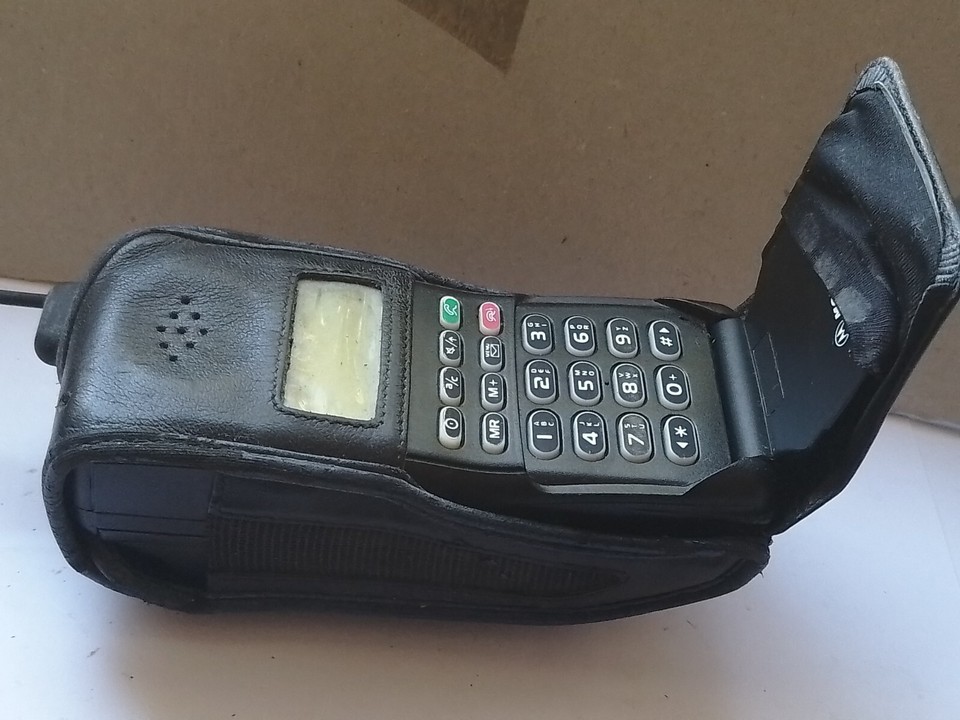 Vintage 1990s Old Retro mobile Phone Shop 0range Motorola flip with ...