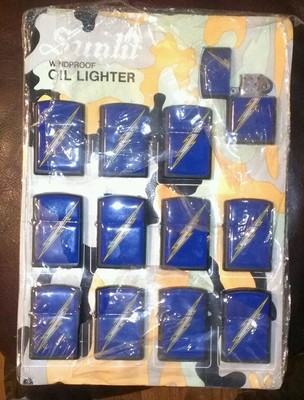 COMPLETE DISPLAY OF 12 NFL SAN DIEGO CHARGERS SUNLIT FOOTBALL LIGHTERS ...