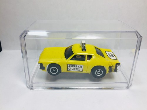 AFX TAXI Yellow & AW Ultra G Chassis & Display case NEW for Aurora TYCO ...