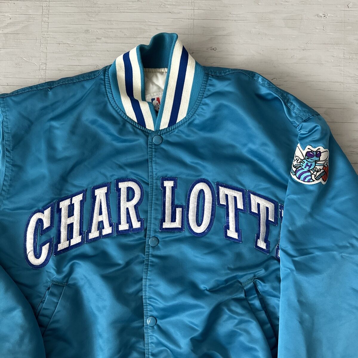 Vintage 90s NBA Starter Charlotte Hornets spellout Satin Vintage 90s NBA Starter Charlotte Hornets spellout Satin