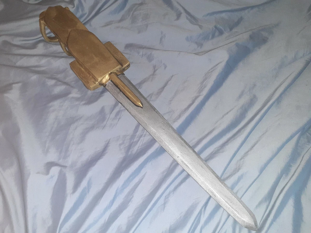Gauntlet Holding Sword