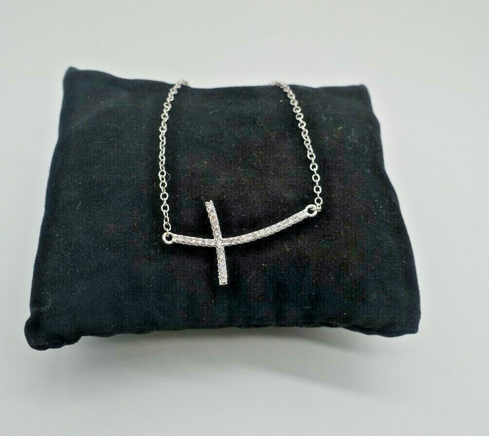 neckless sideway cross with clear crystals on cross with extension on ...