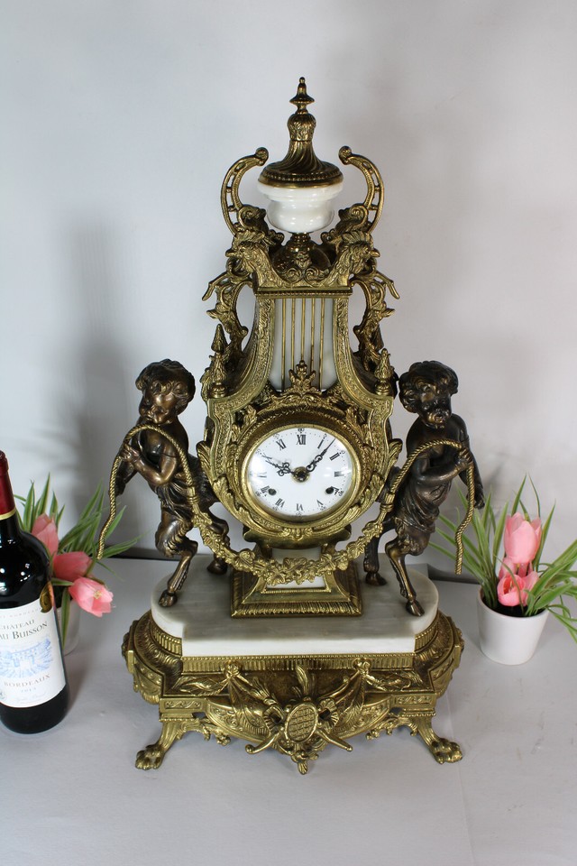 XL Bronze marble Faun putti cherub mantel clock | eBay Australia