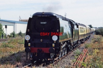PHOTO SR WEST COUNTRY LOCO NO 34067 TANGMERE AT NEWBURY RACE COURSE ...