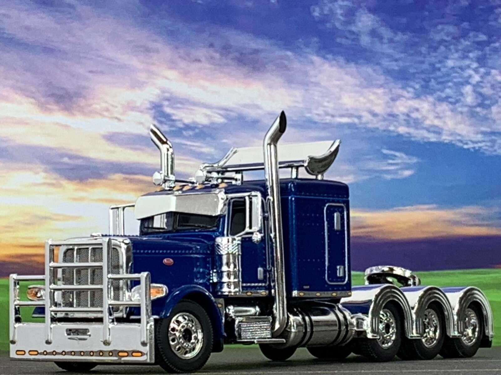 1/64 DCP SOVEREIGN BLUE PETERBILT 389 TRI AXLE FLAT TOP SLEEPER W ...