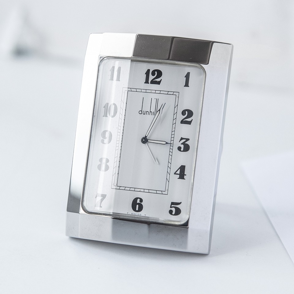 Dunhill stainless steel multi faceted quartz travel clock Model 06. ...