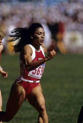Florence Griffith Joyner USA competes in the 100M race d- Olympic 1988 ...