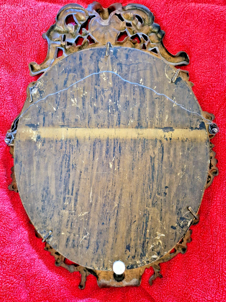 Antique oval bronze or cast iron wall hung mirror | eBay UK