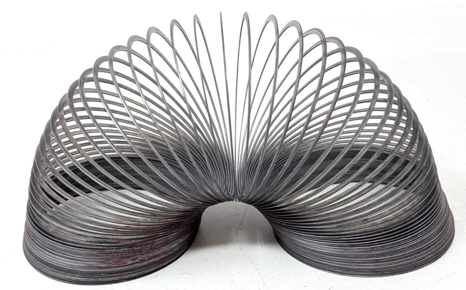 Vintage 1947 James Industries Red Slinky Metal Spring Toy USA with ...