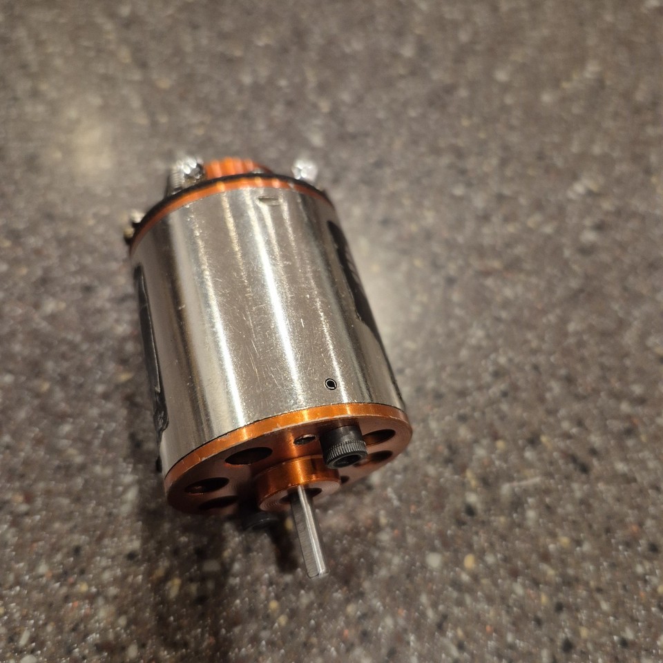 Trinity 1985 World Champions Motor -ORANGE - Tested. 2 holes re-tapped ...