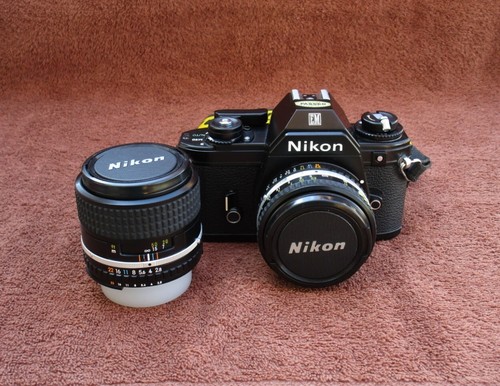 nice black Nikon EM camera with two Nikon Series E lenses - vintage ...