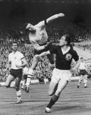 England goalkeeper Ron Springett punches ball clear opening minutes ...