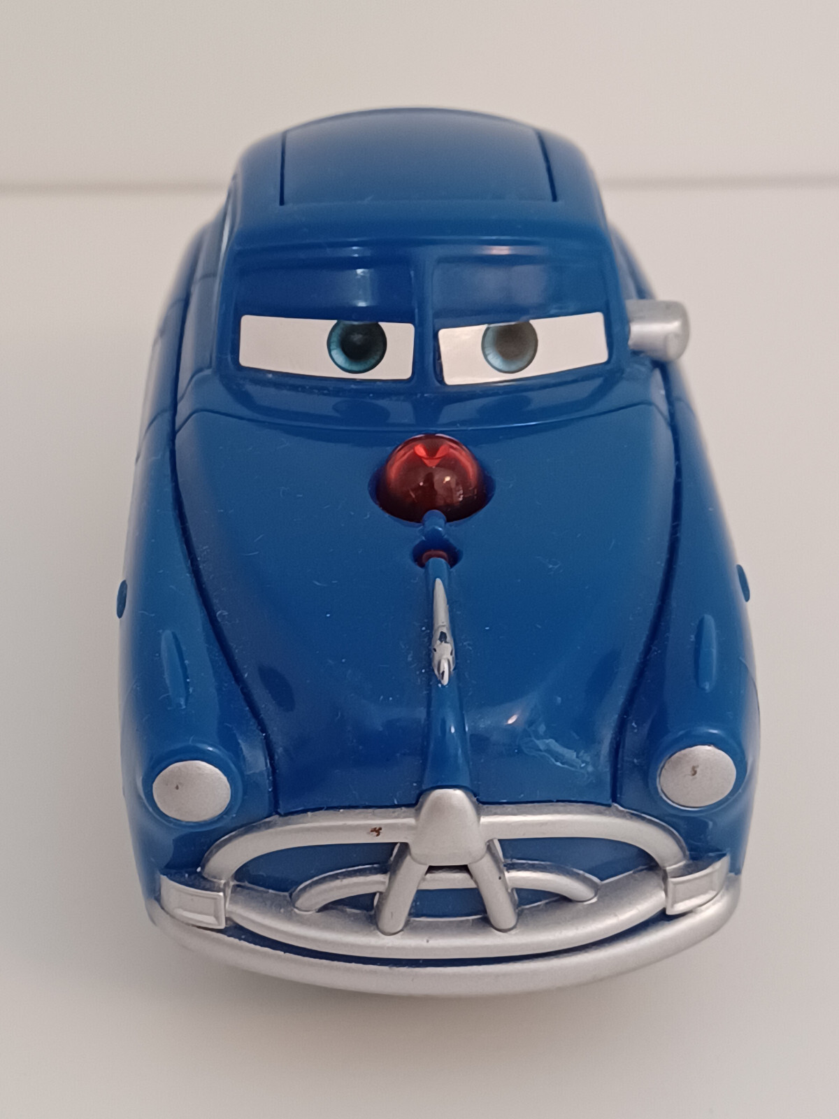 Disney Pixar Cars Energizer Doc Hudson & Piston Cup Trophy Launcher