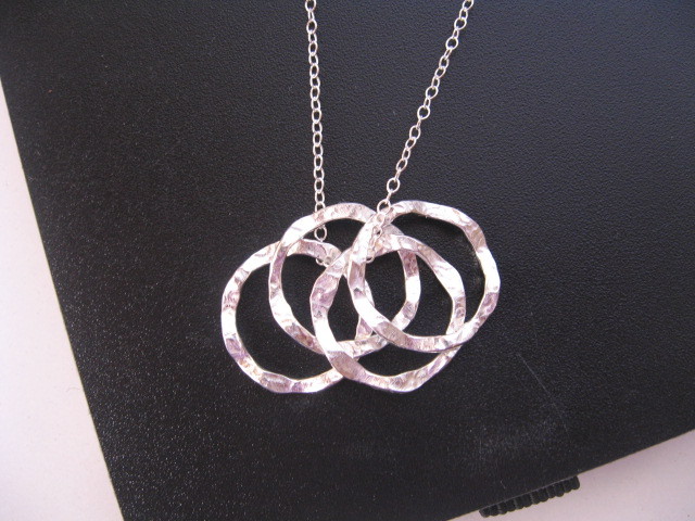 Eternity Circle Necklace Four Wavy Friendship Rings on a Sterling ...