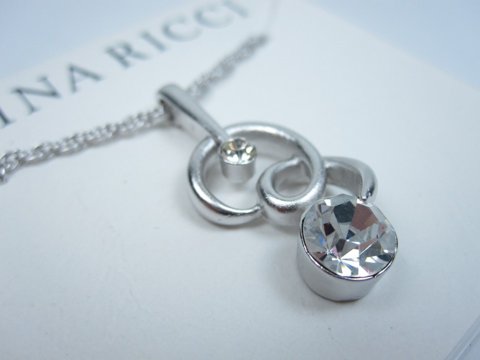 Nina Ricci Rhodium Plated Pendant with Swarovski Crystals 16-18" Length ...