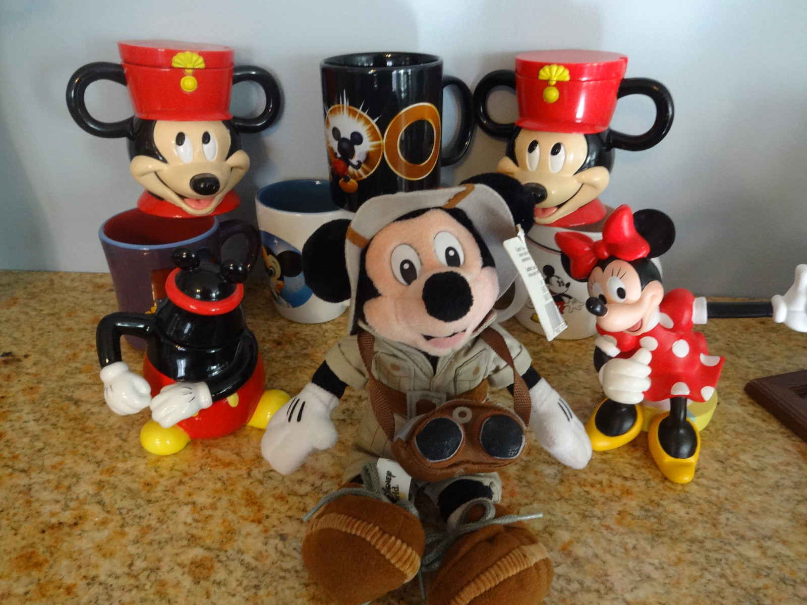 Lot 10 of Mickey Mouse items (Mugs,Figurine,Sugar Holder, Safari Mickey ...