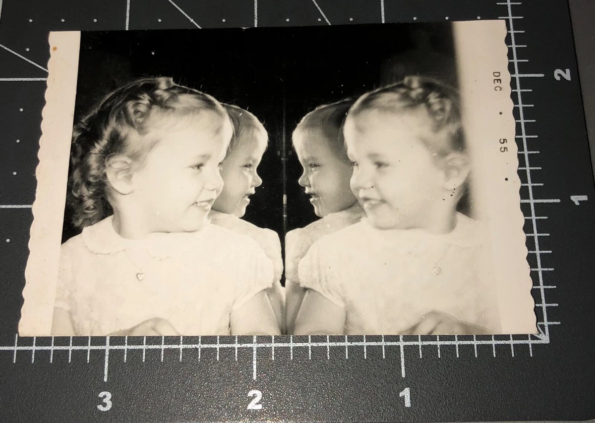 Twin Reflection In Mirror