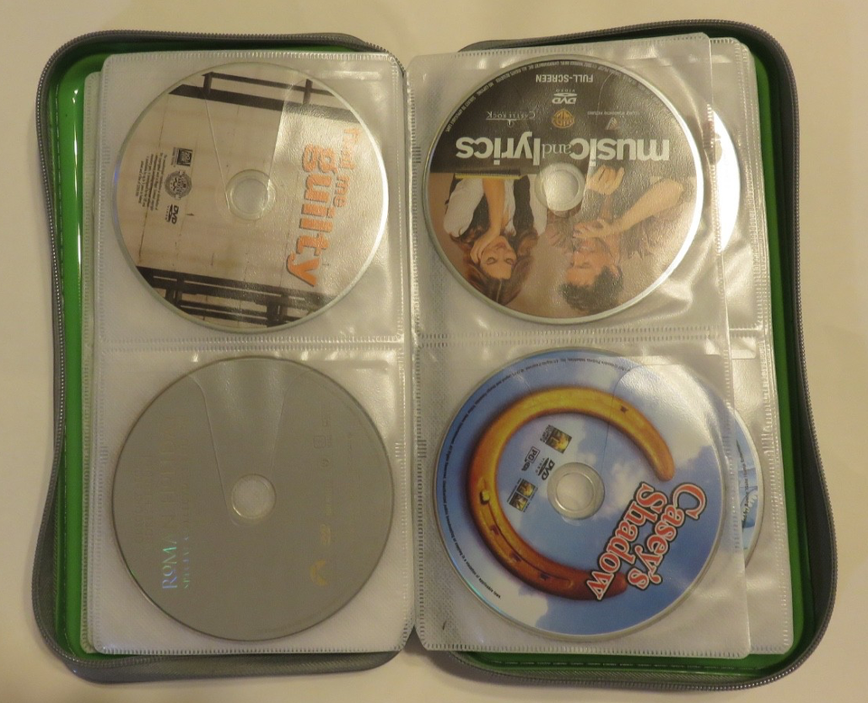 96 Loose DVD Movies in a NEW Green Zippered Binder - Assorted Genre ...