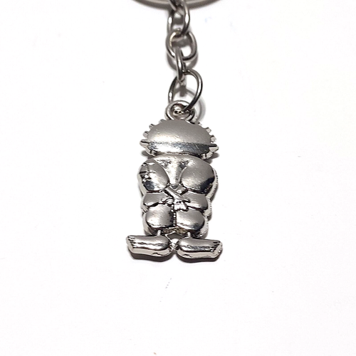 A metal key holder in the shape of the Palestinian character Hanzala ...