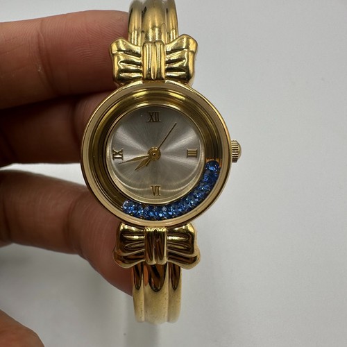 Avon Watch Women Gold Tone Bow Accents Floating Blue Crystals New ...