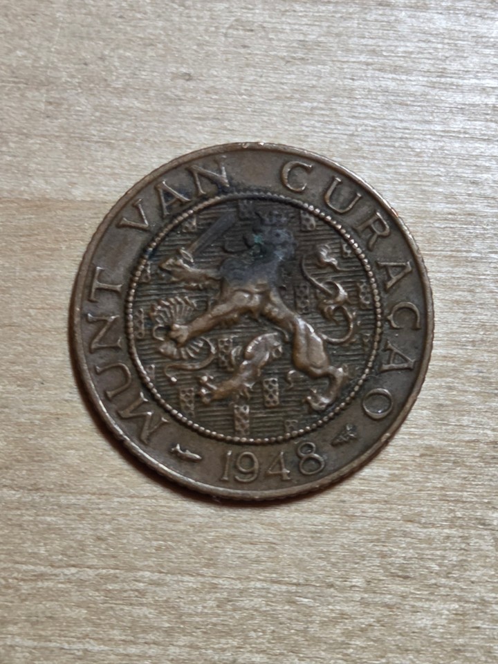 Curacao 2 1/2-cents coin, 1948. KM# 42, bronze. Rampant lion, orange ...