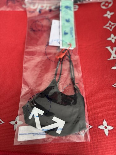 Off-White Arrow Logo Printed Face Mask arrow design. Classic black and ...