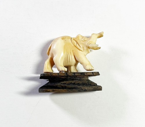 Vintage faux ivory miniature carved elephant on wood base - 2" x 1 3/4 ...