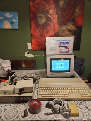 Atari 1040 STf. Works Includes Monitor/ATR 800 & supra modem 2400 ...