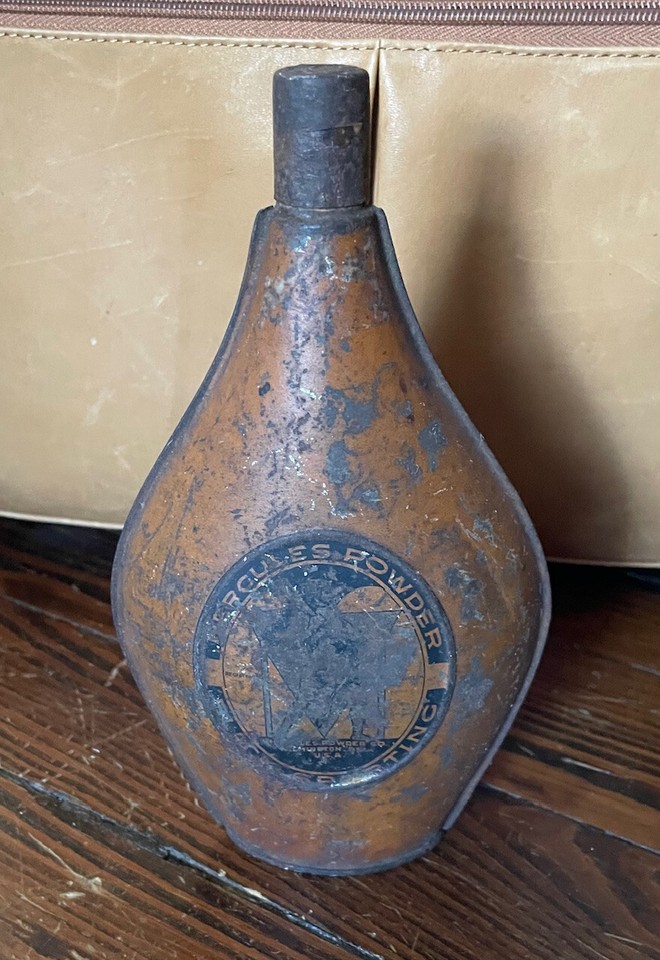 Hercules metal powder flask with metal cap. Intact, but orange finish ...