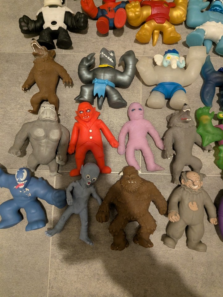 (X38) In Total . A collection of Heroes of Goo Jit Zu action figures ...