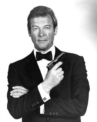Roger Moore Bond pose gun across chest in tuxedo For Your Eyes Only ...