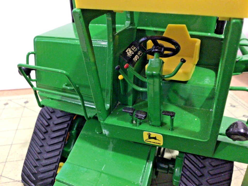 Custom John Deere 6600 combine on tracks with raisable 6 row corn head ...