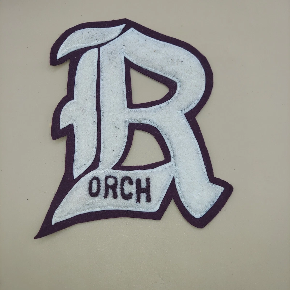 Teal Varsity Letter R