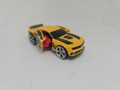 Transformers Autobot Bumblebee 2010 w/dual blasters, 3.25" Camaro car ...