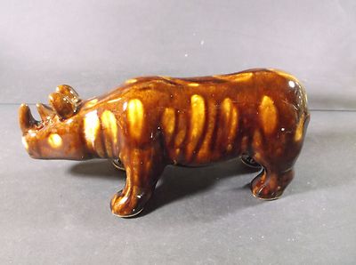 Rockingham style brown drip glaze ceramic rhinoceros figurine | eBay