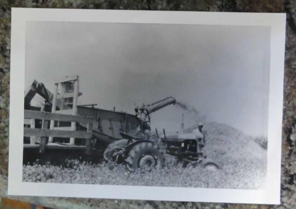 Farmer with Huber Threshing Hay Machine and Tractor on Farm Vintage ...