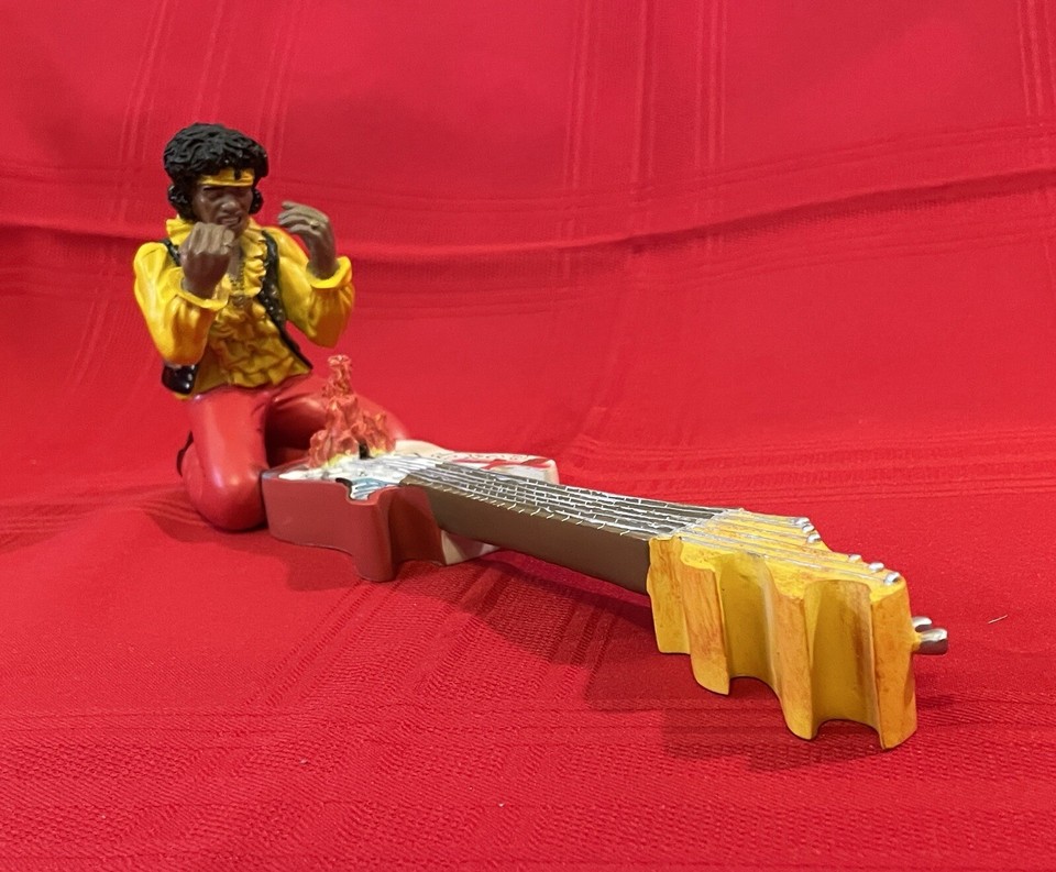 Jimi Hendrix Figure Sitting Burning Guitar in 1967 at the Monterey Pop ...