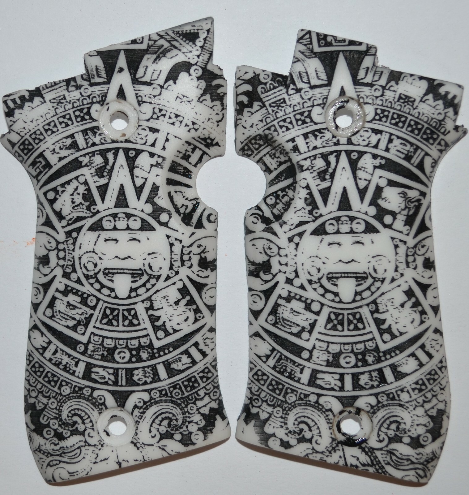 Beretta 85 , FS pistol grips engraved aztec calendar on white plastic ...