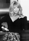 Teri Garr smiling pose in black sweater 1989 Let it Ride movie 11x17 ...