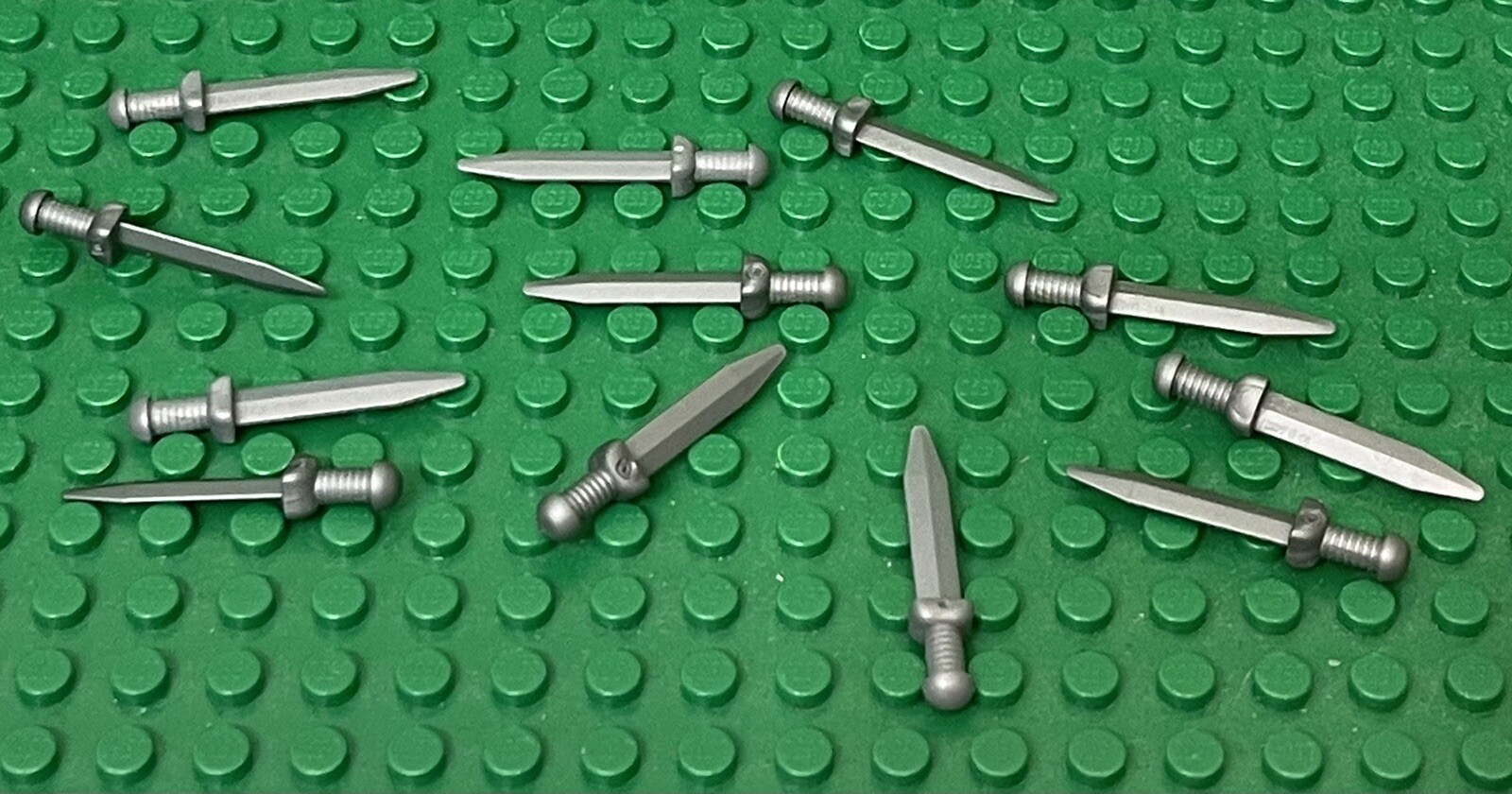 Lego 12 Pieces flat silver Roman Gladius sword / Castle Mini Figures ...