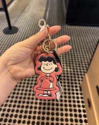 Coach x Peanuts 2025 Lucy Leather Bag Charm Keychain CBG58 Pink ...