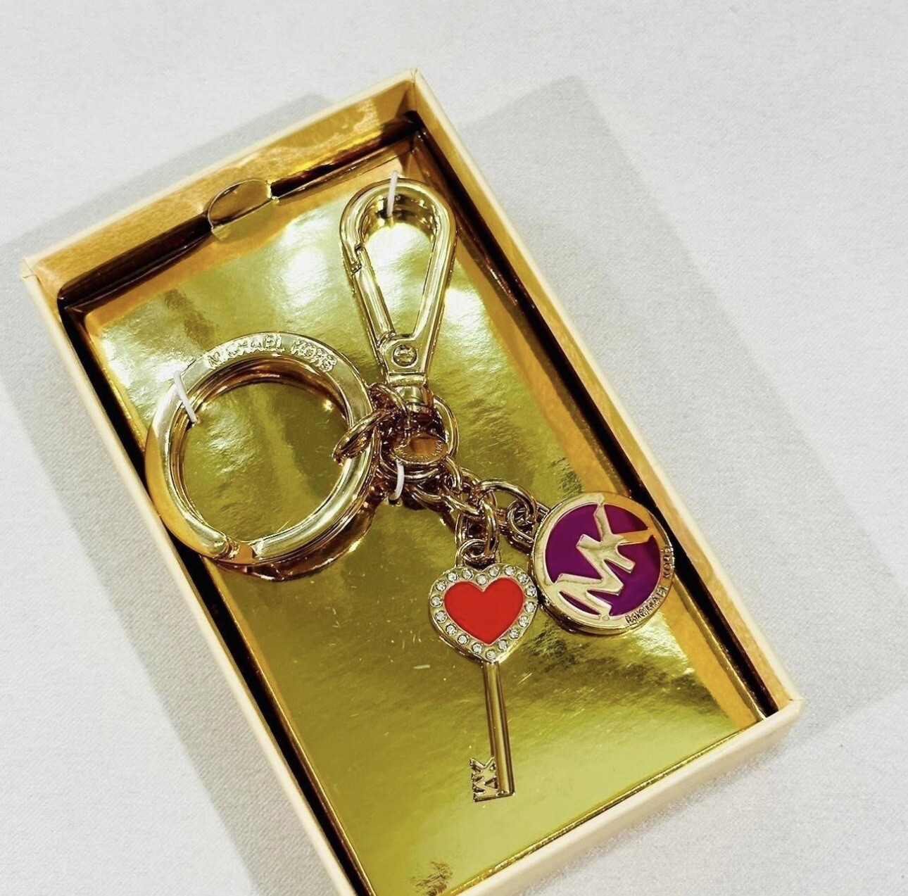 Michael Kors gold tone purse charm keychain charm
