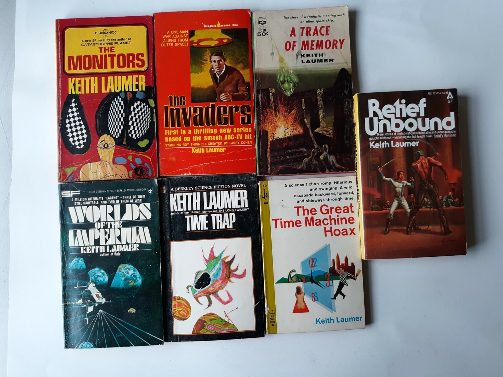 7 sci fi paperbacks by Keith Laumer...Invaders...Retief...Time Trap ...