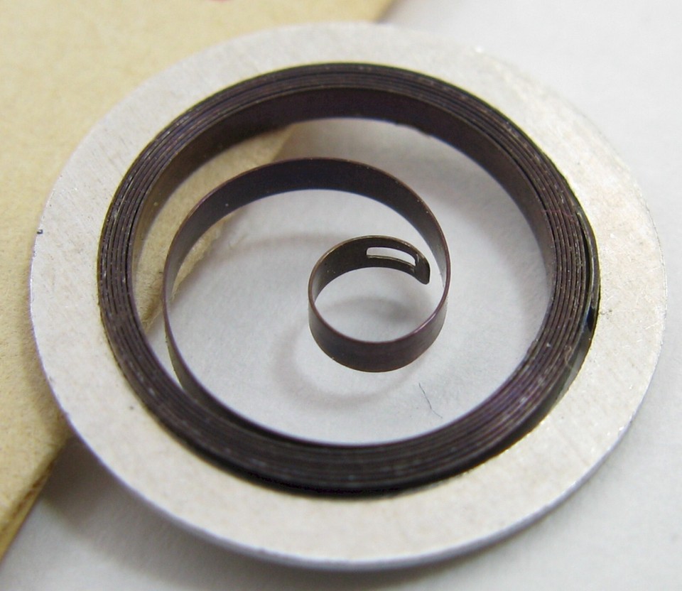 Omega 28.10 watch part "771" blue alloy mainspring without / NO bridle ...