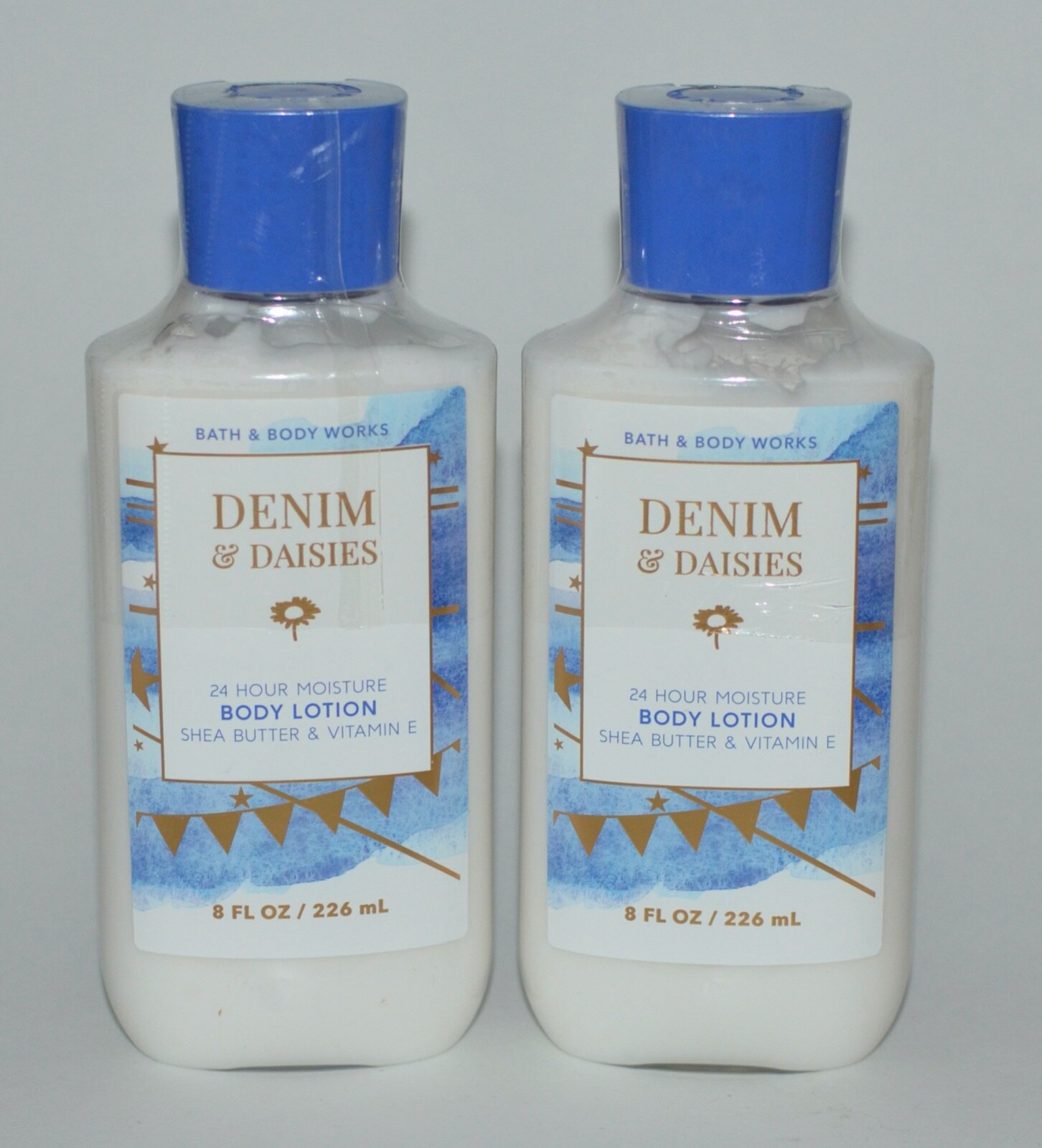 2 BATH & BODY WORKS DENIM & DAISIES LOTION CREAM HAND 8 OZ CITRUS SHEA ...