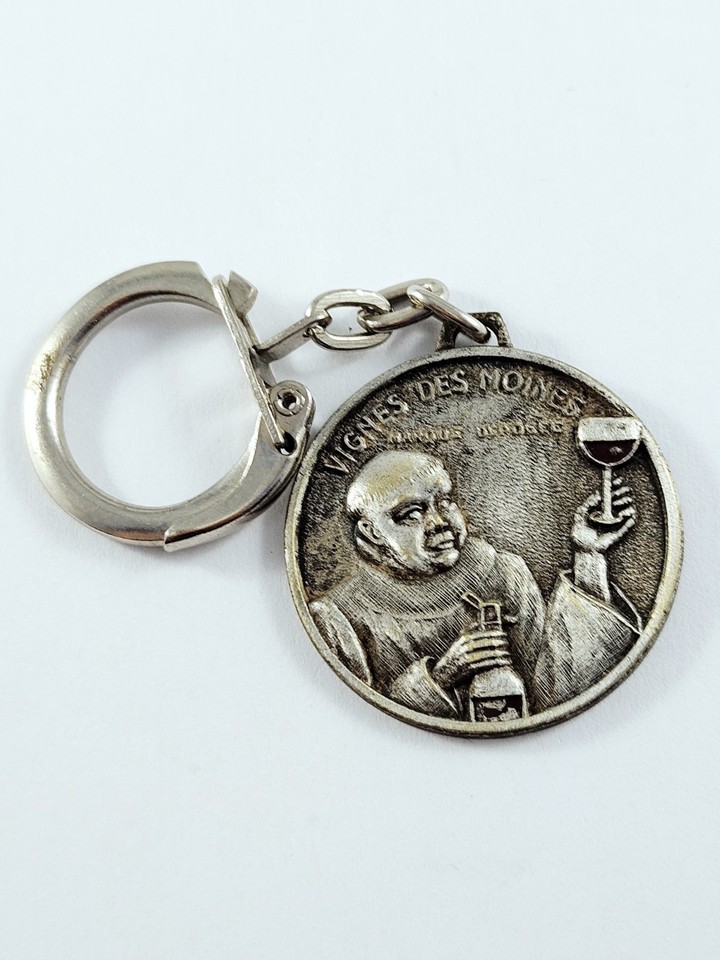 Keychain - Wines Lion & Sons - Jandun, Engraving Monk - Vintage Metal ...